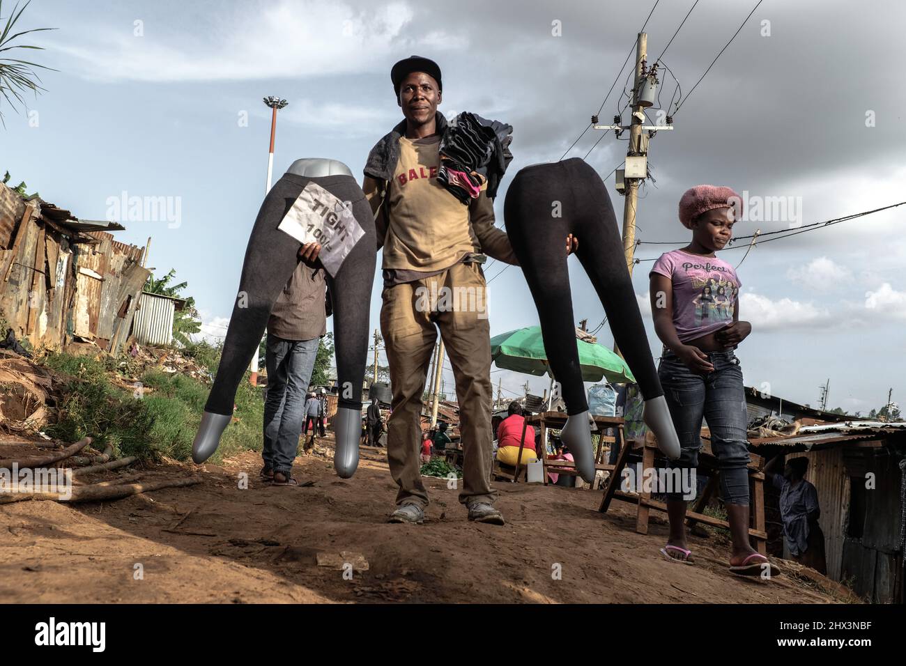 A clothes vendor sells ladies skin tights by the streets of Nairobi's ...