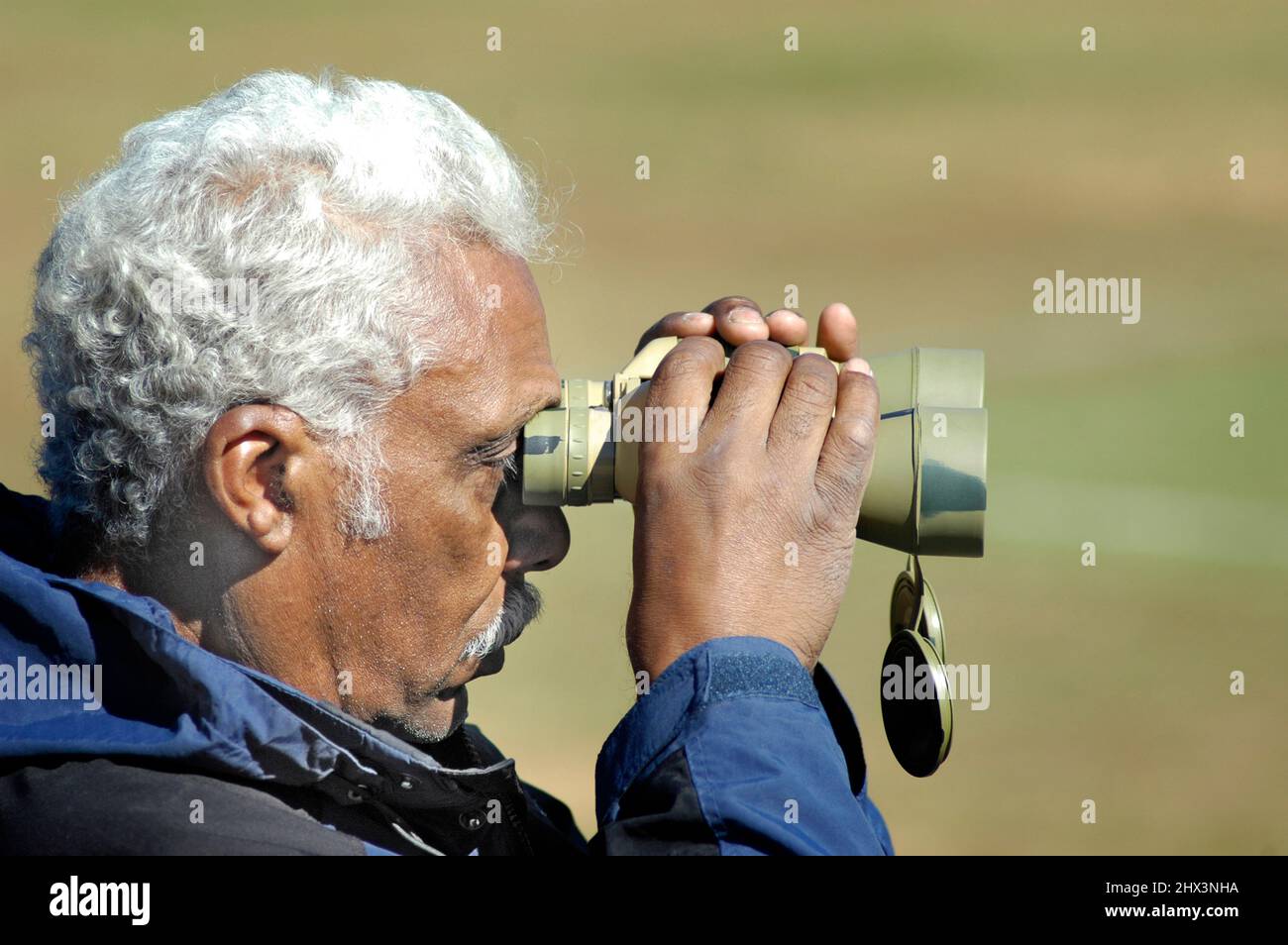 Face of a happy 66 year old happy ethnic black man watching his ... Face of a happy 66 year old happy ethnic black man watching his ...