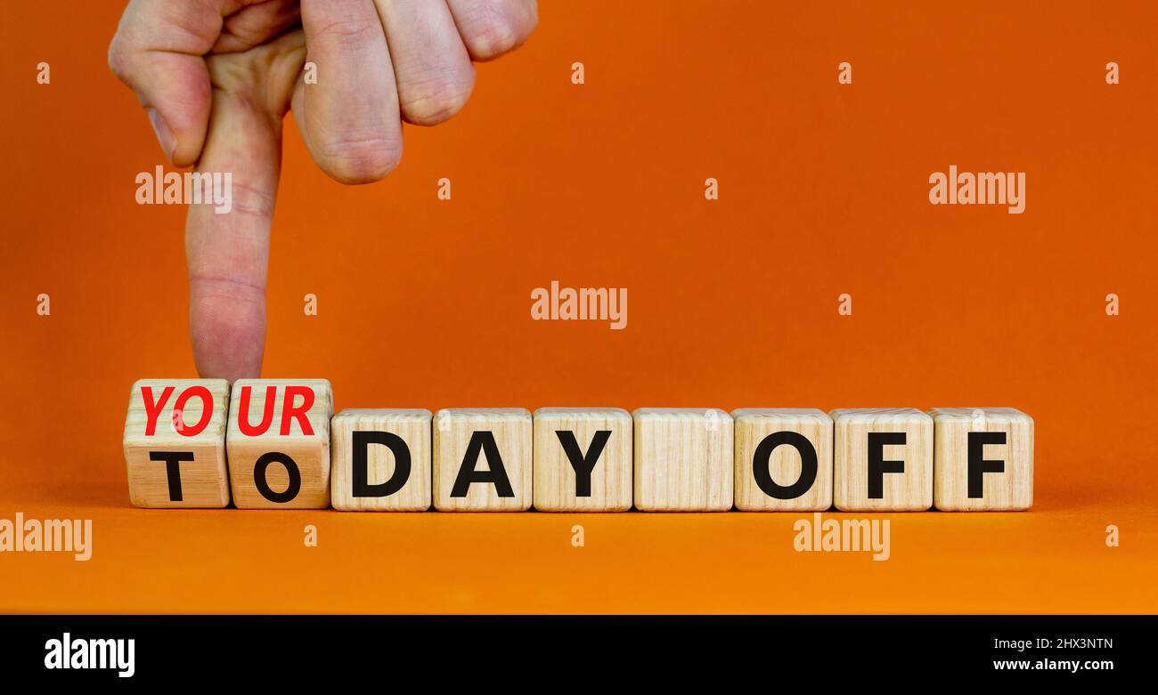 Today is your day off symbol. Businessman turns cubes and changes ...