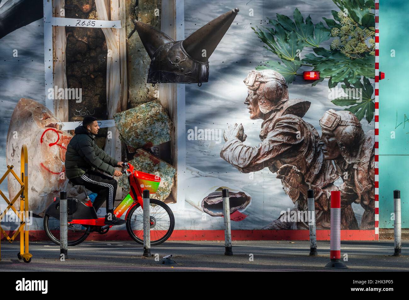 London, UK. 9 March 2022. A cyclist passes one of the two 25m long ...