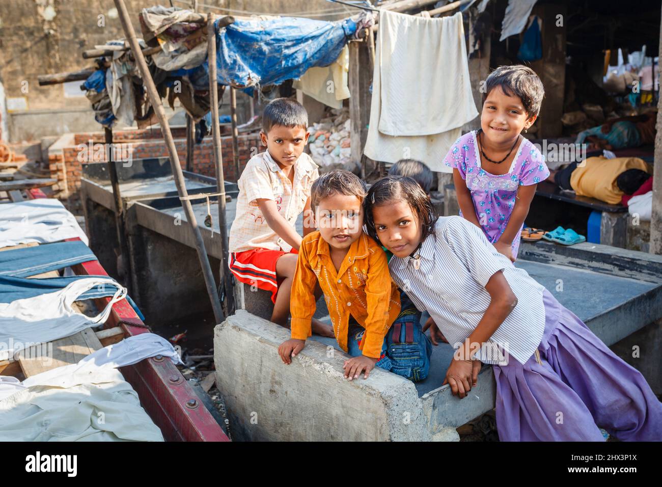 Indian girl washing clothes hi-res stock photography and images - Alamy