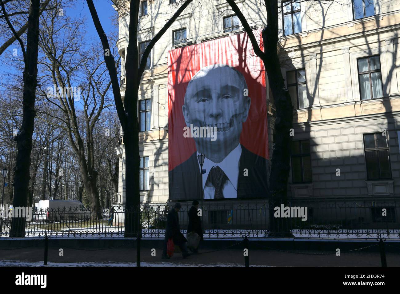 Riga, Latvia. 09th Mar, 2022. A large poster with a portrait of Russian ...