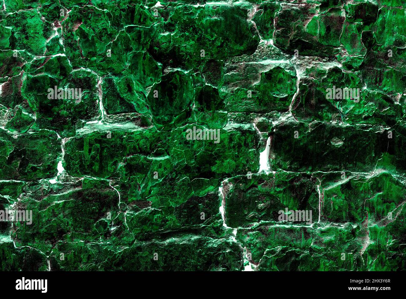 Damaged dark green surface of an old abandoned brick wall for texture ...