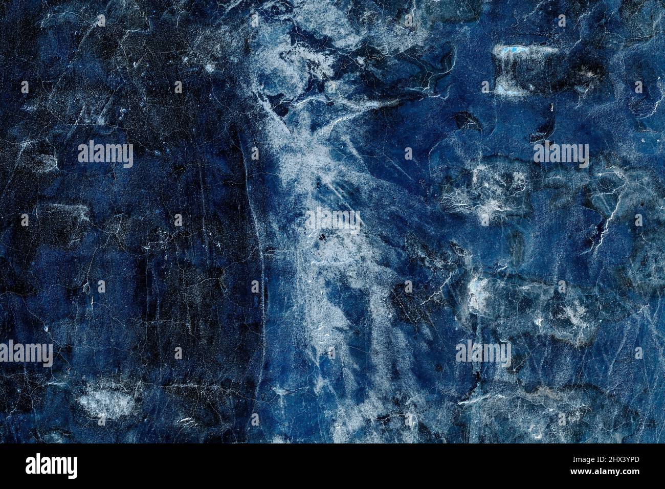 Dark blue rugged concrete wall surface with scratches and grunge ...