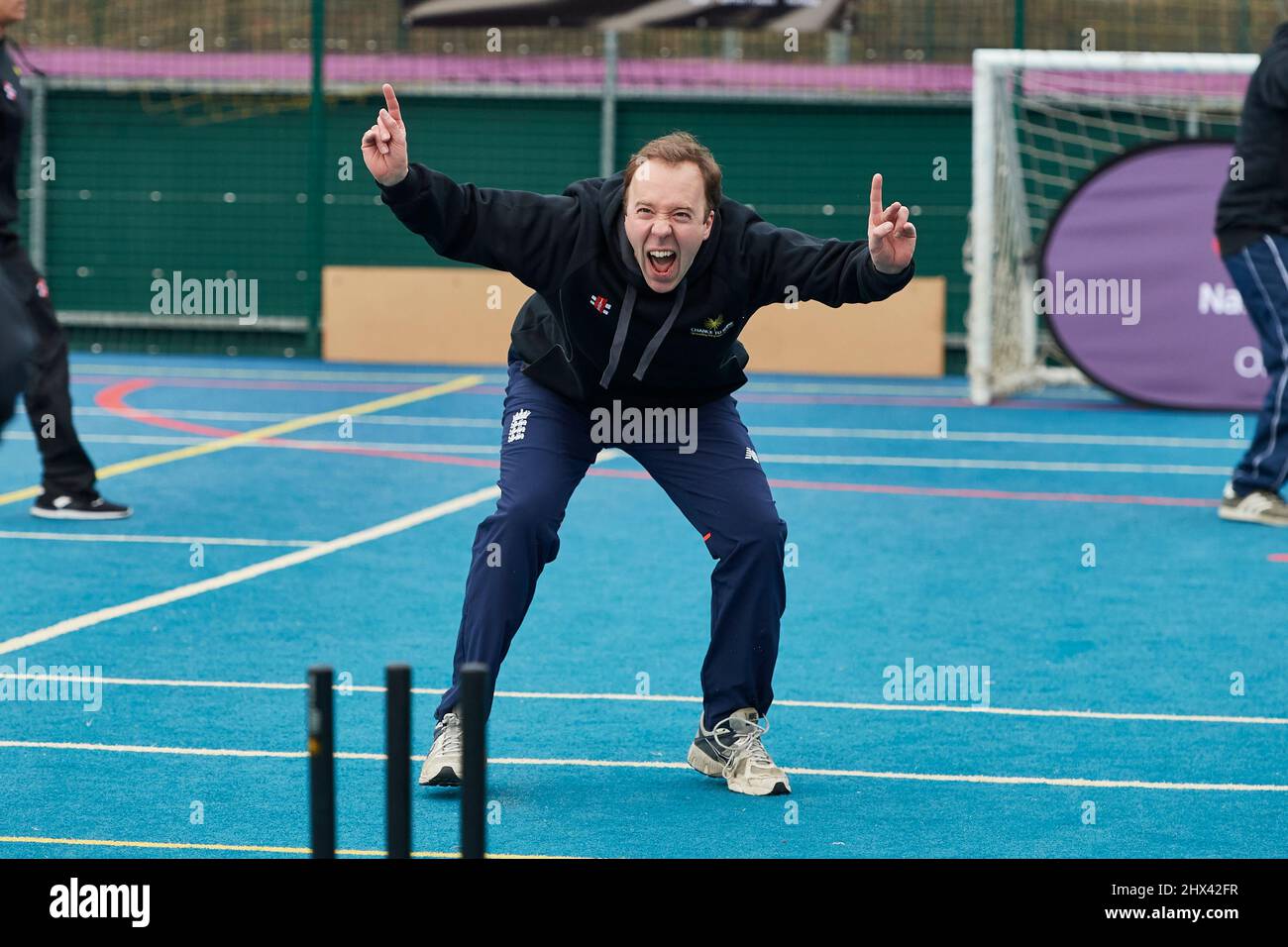 Matt Hancock playing charity street cricket Stock Photo - Alamy