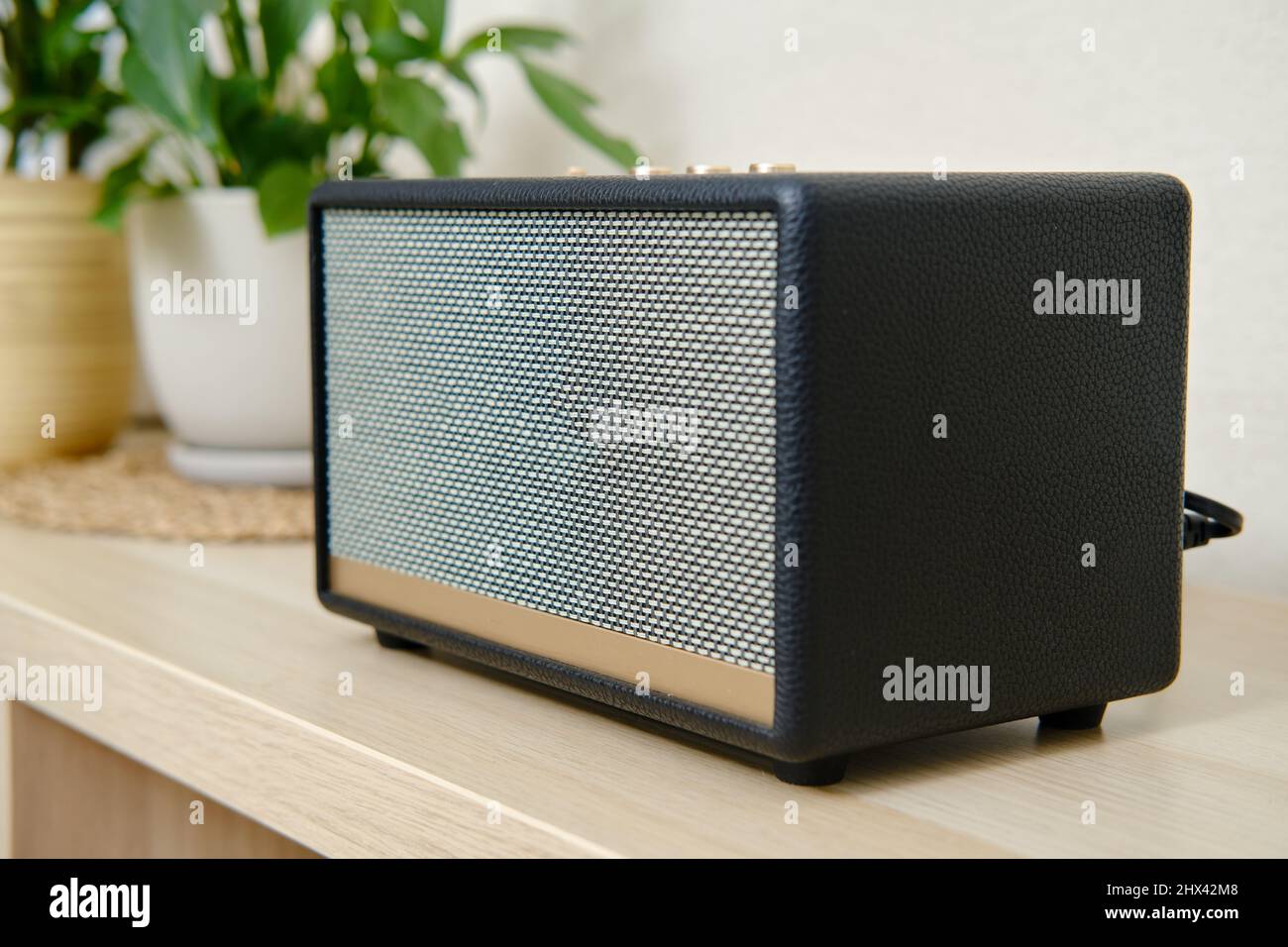 Acoustic music speaker in retro style. Vintage sound column in an old ...