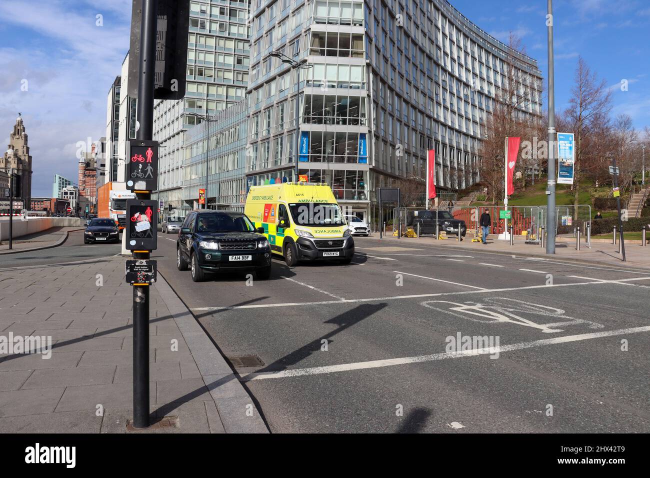 Vehicles and emergency ambulance travelling along The Strand in ...