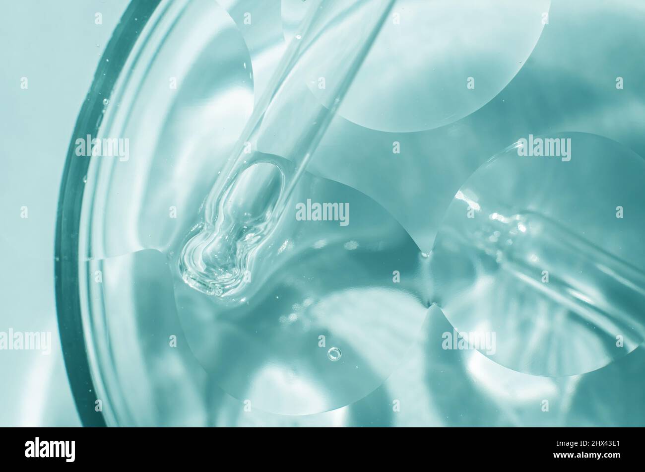 Close-up - the structure of the gel. Transparent cosmetic gel in a ...