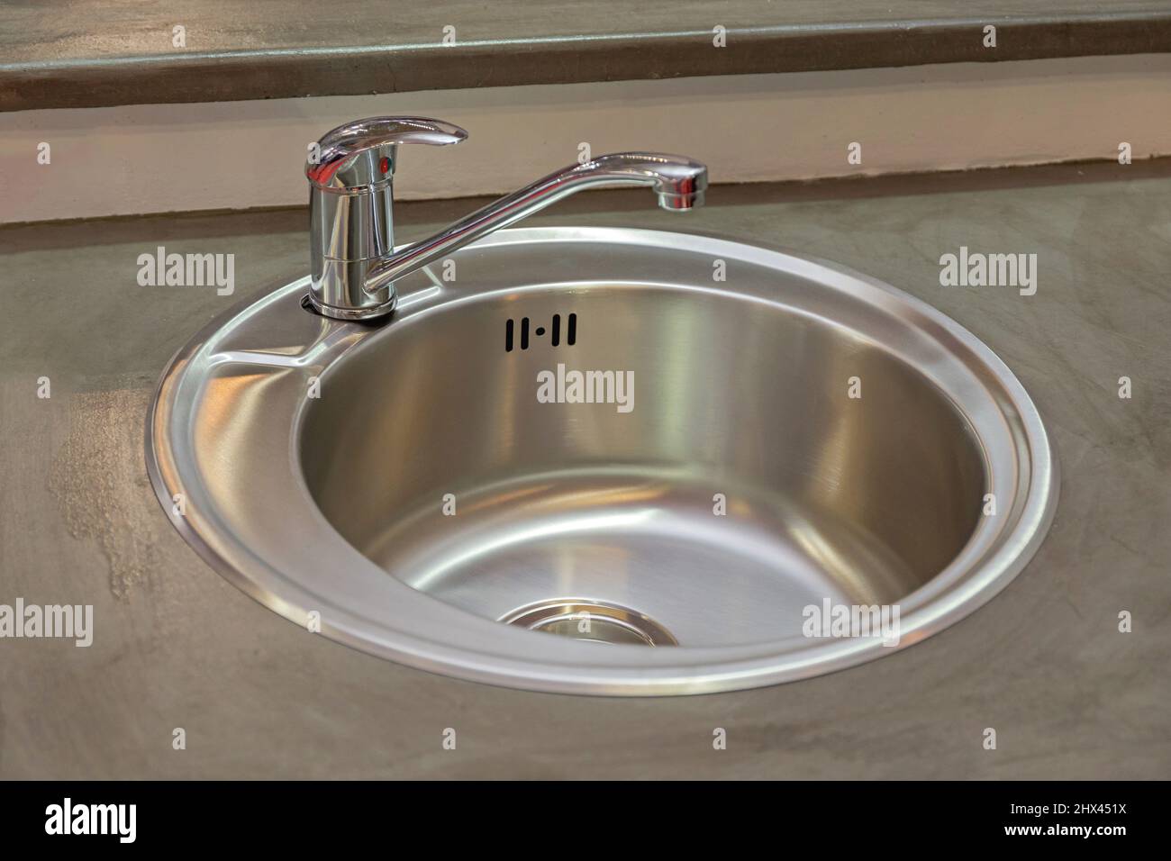 Small Round Stainless Steel Sink at Kitchen counter Stock Photo - Alamy