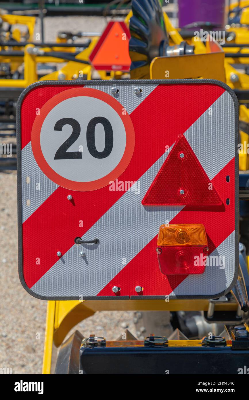 Speed Limit at Agriculture Machine Trailer Signal Stock Photo - Alamy
