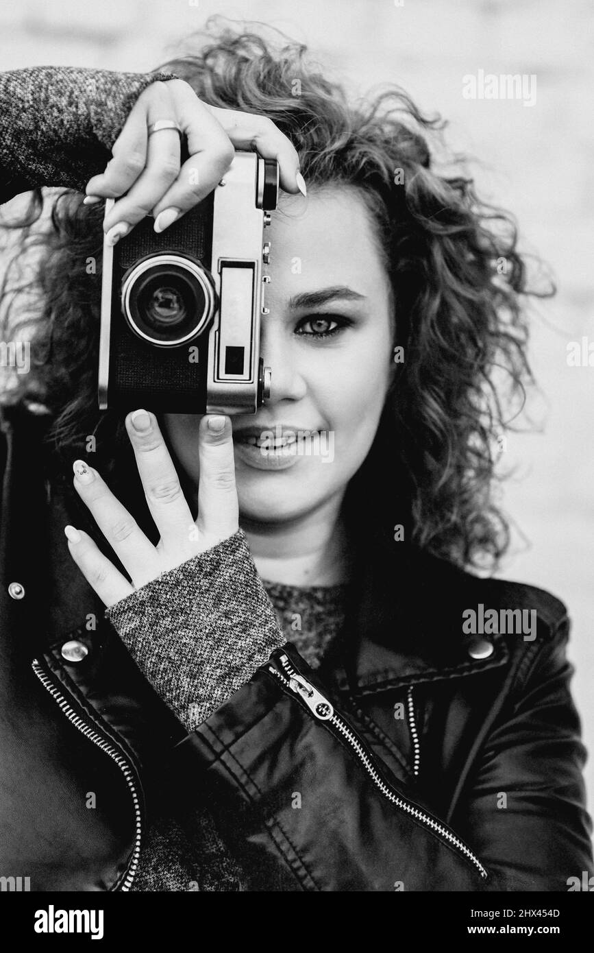 Monochrome Portrait Of Young Beautiful Cheerful Woman With Red Curly