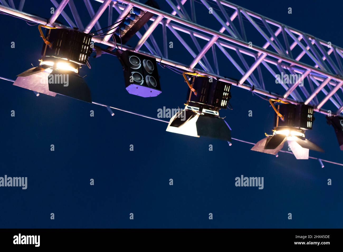 Concert light installation poles, purple lights and fogs Stock Photo ...