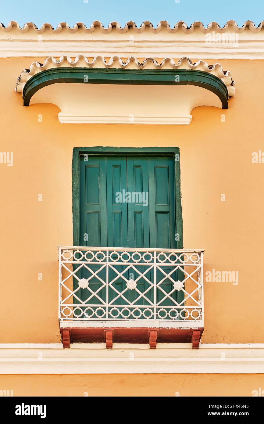 Large balcony with wooden railings of colonial Spanish style house in ...