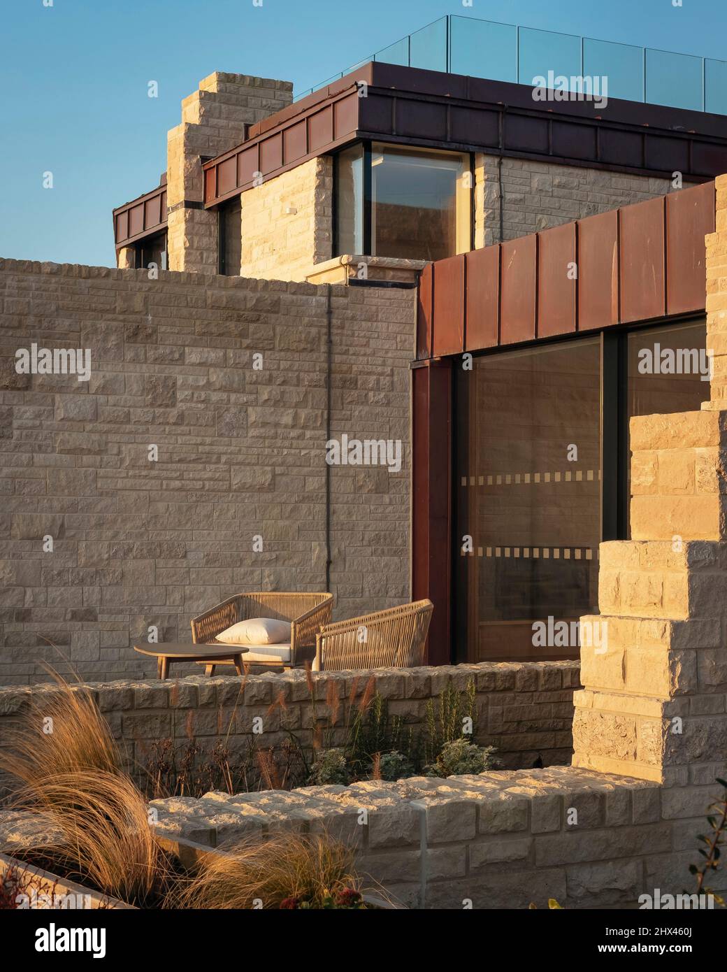 Exterior view of hotel accommodation window with private seating area ...