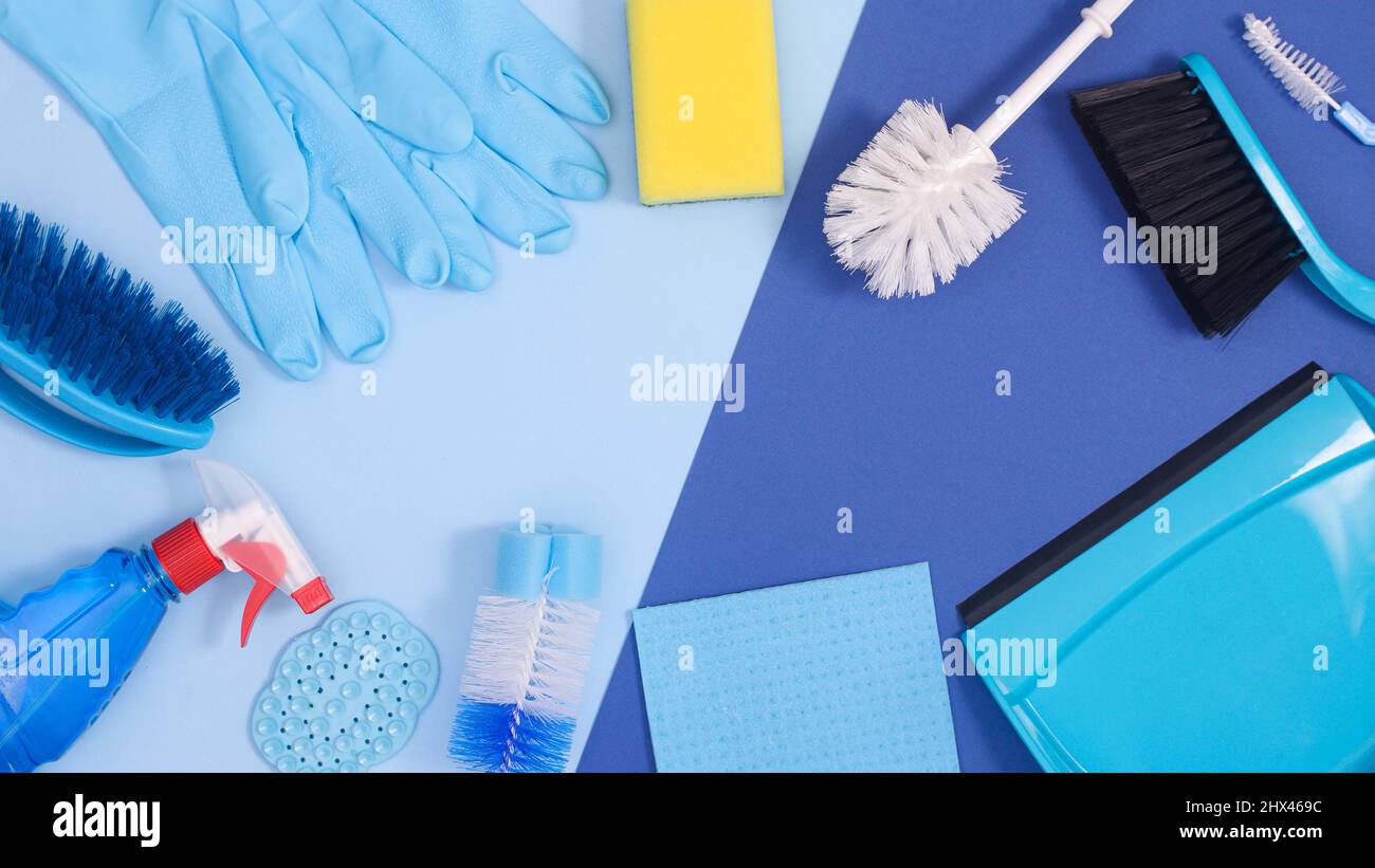 Creative copy space frame background with cleaning tools on pastel and ...