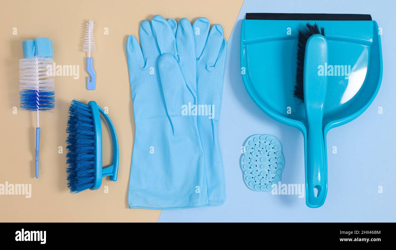 Cleaning tools layout on pastel beige and blue background. Flat lay ...