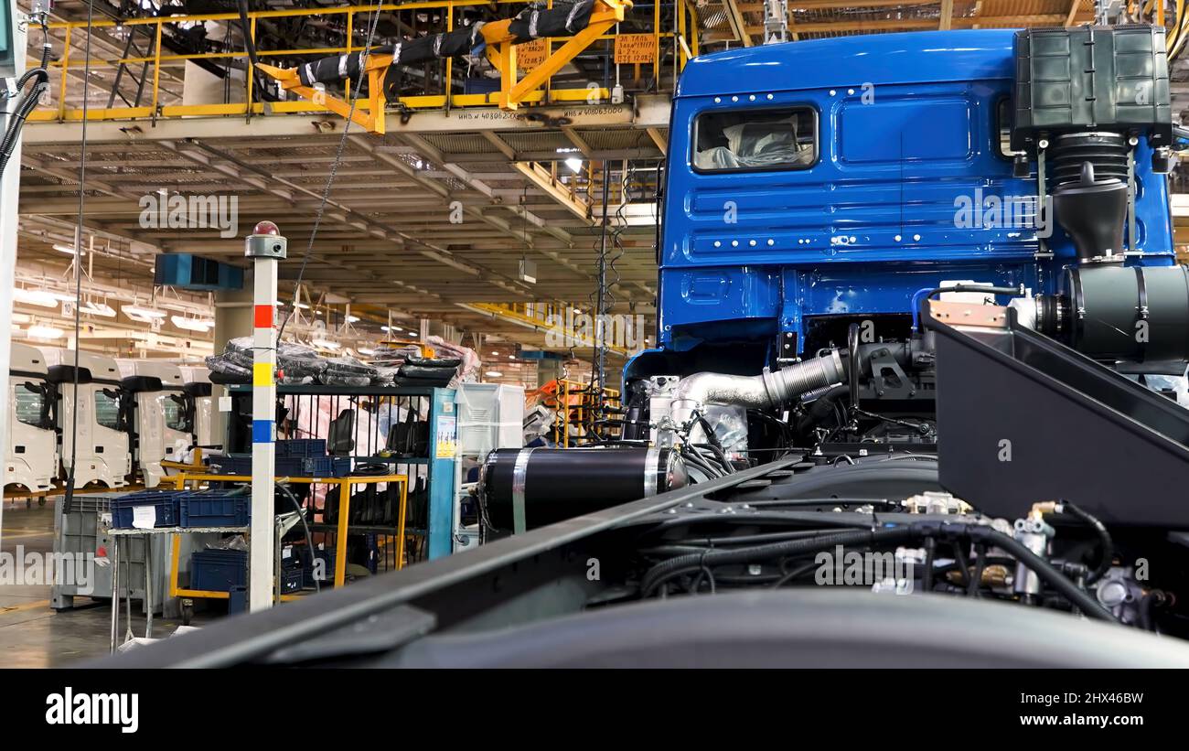 Automobile assembly line production at the Kamaz truck factory. Time ...