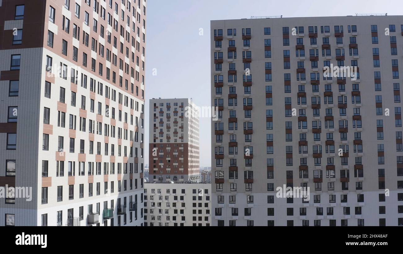 Aerial view of apartment buildings in a residential area. Flying among ...