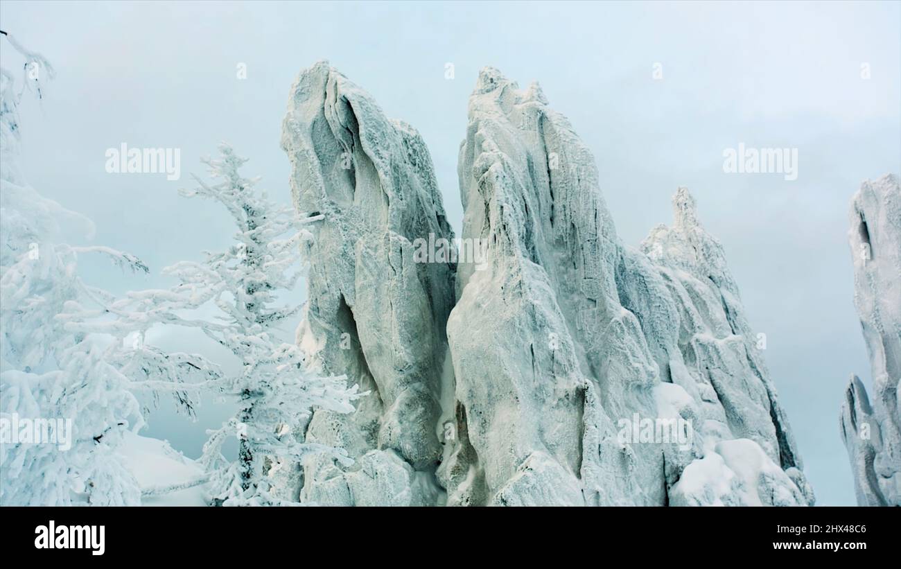 Snowy Rock in the forest. Video. snowy rocks in the mountains with ...