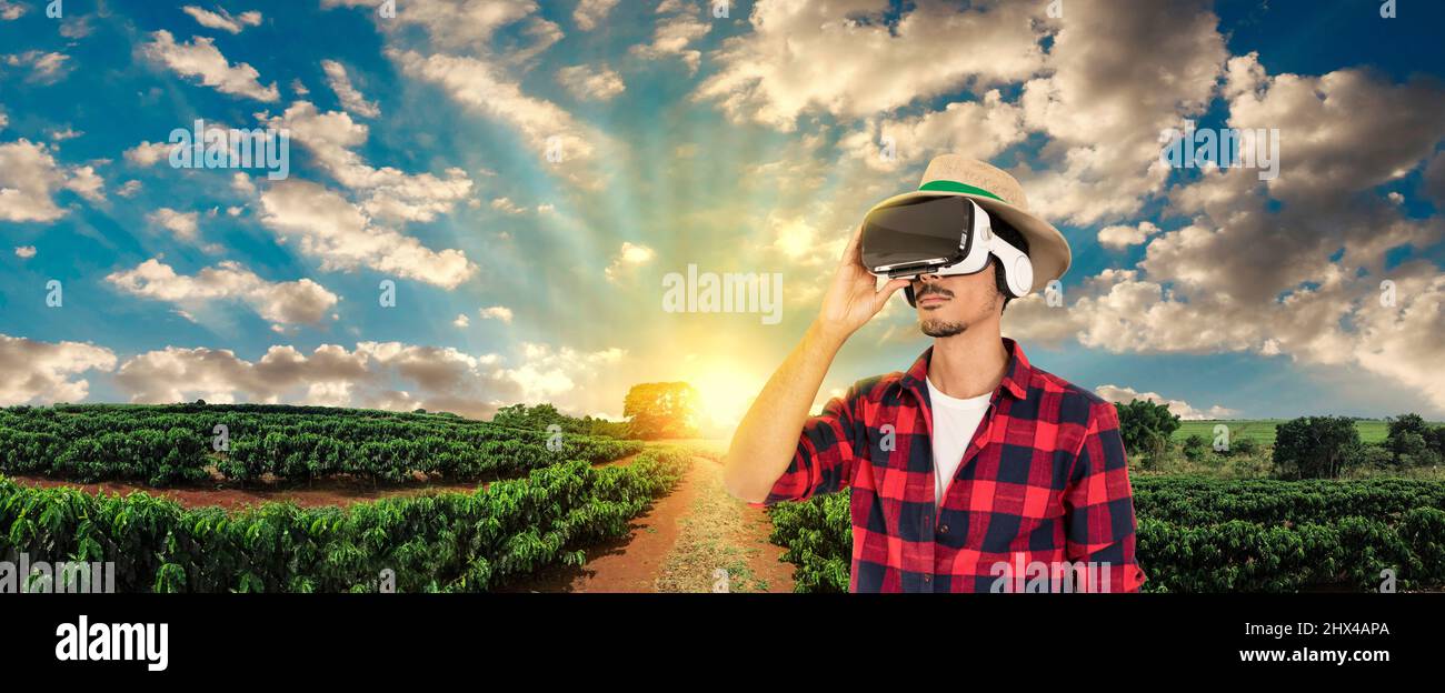 Farmer with hat and virtual reality glasses on coffee FARM Stock Photo ...