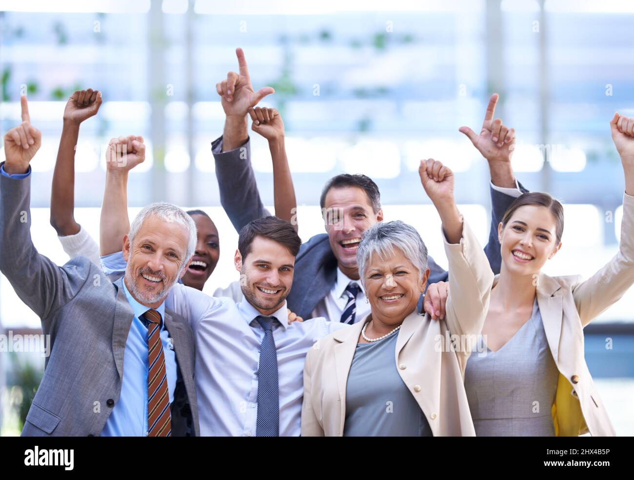 Another team success. Cropped shot of a group of office coworkers Stock ...