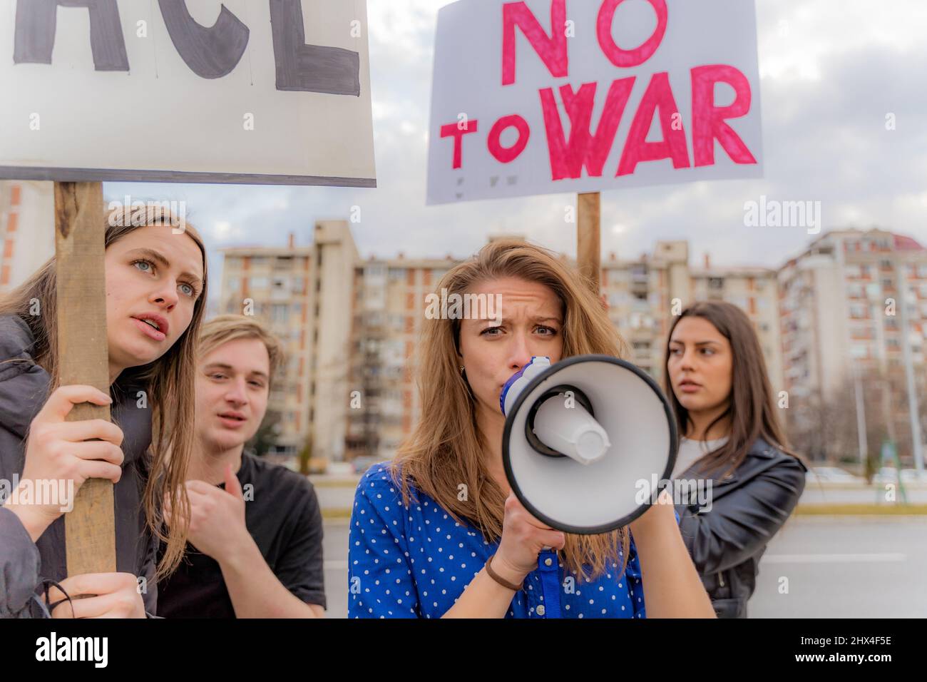 Group of beautiful and sad people are protesting to stop the war Stock ...