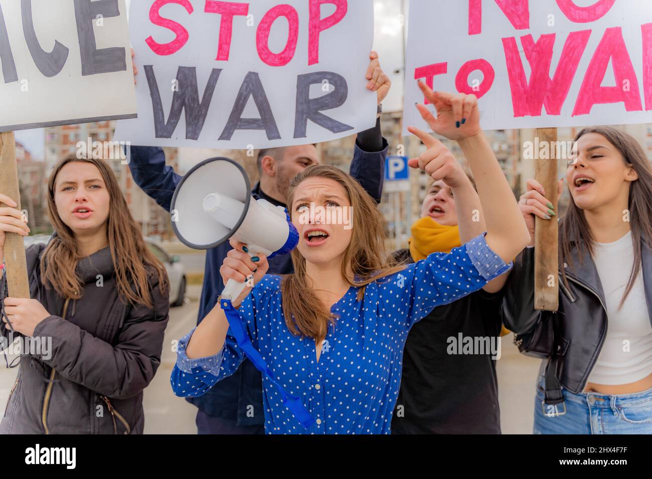Group of people are protesting for the war outside Stock Photo - Alamy