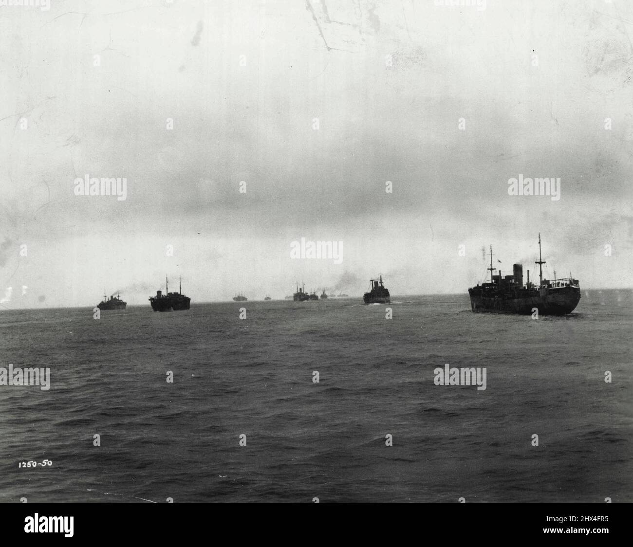 In Action: Part of a huge convoy, of United Nations, ships somewhere in ...