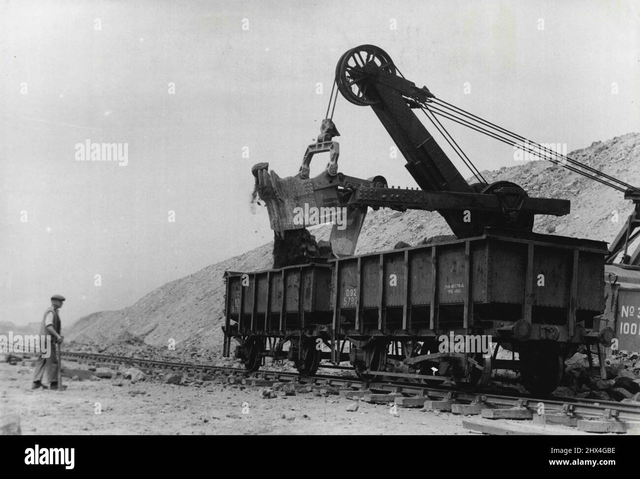 Blasting Iron Ore: A Mine At Corby, Northants -- Ironstone is loaded ...