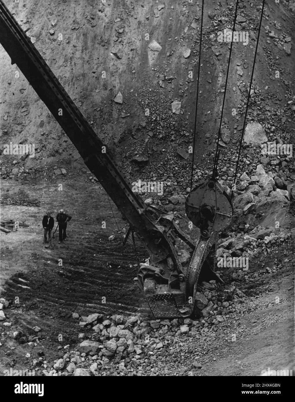 Blasting Iron Ore: A Mine At Corby, Northants -- Dwarfing the men, the ...