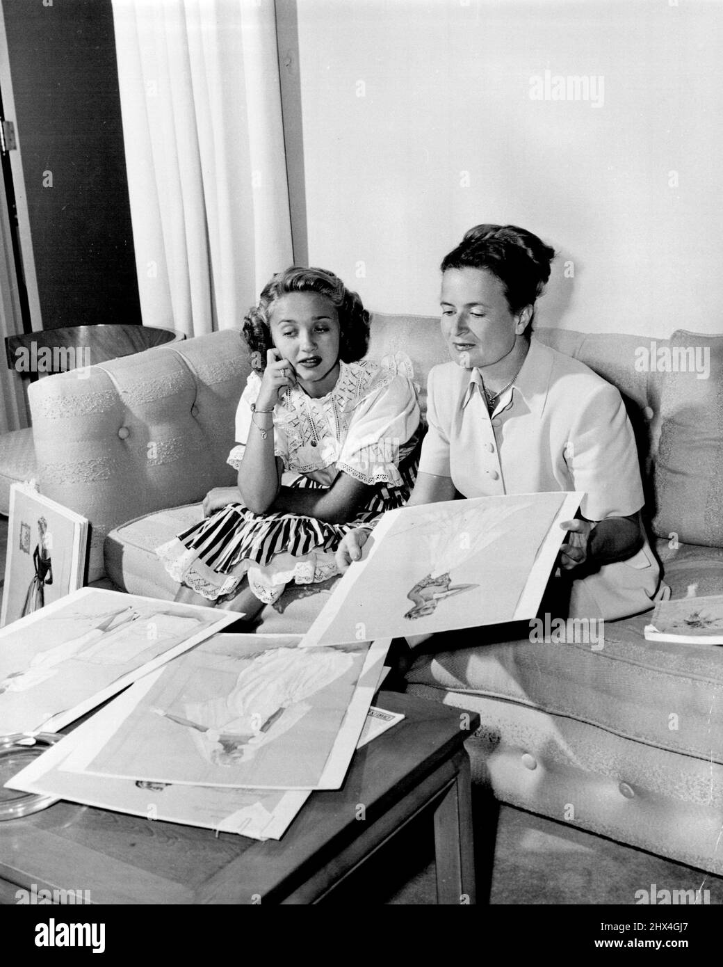 Irene and Clane Powell look over sketcher for "Luxury Liner" - MGM ...