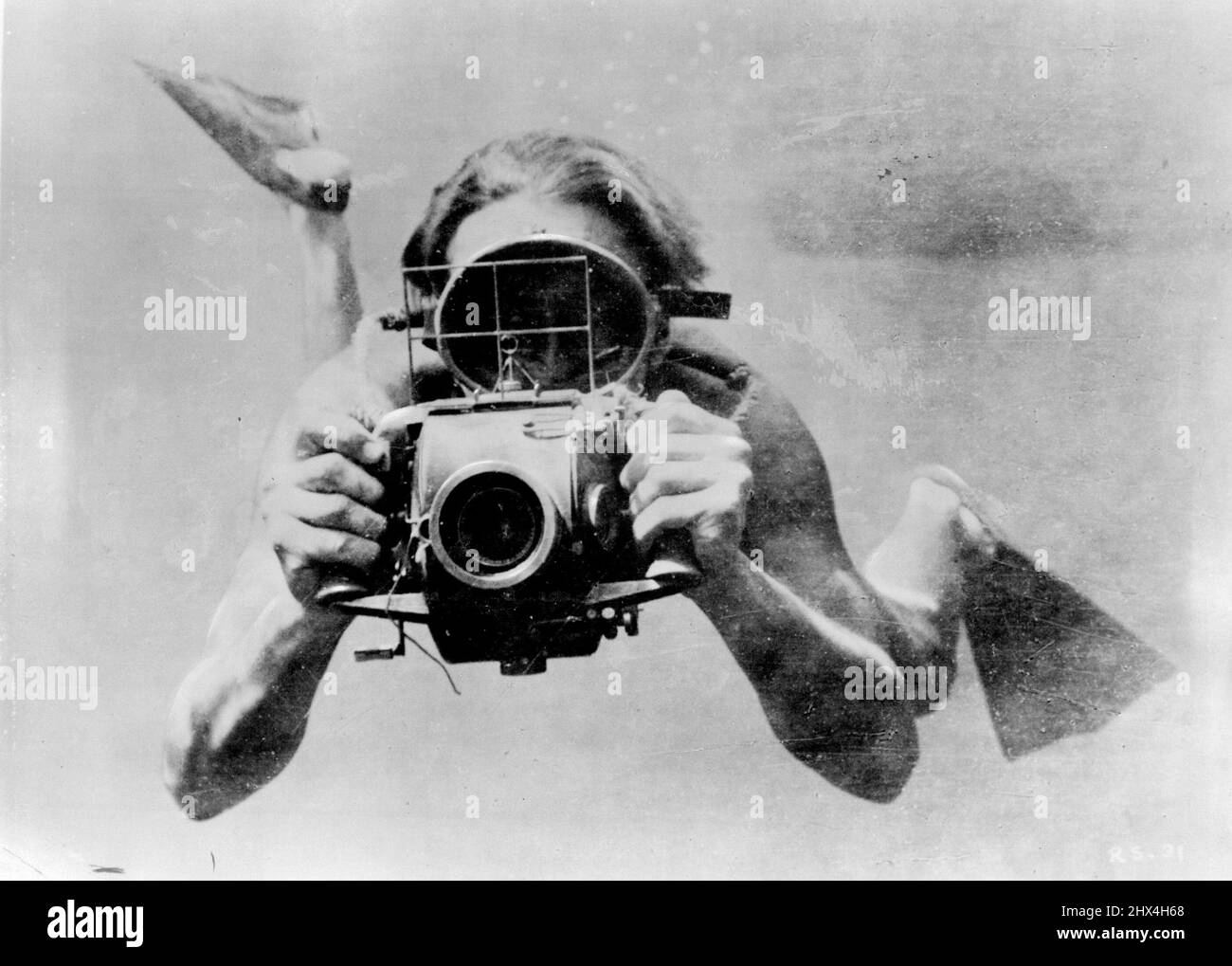 Dr. Hans Hass. No wonder the sharks go the other way when they see this ...