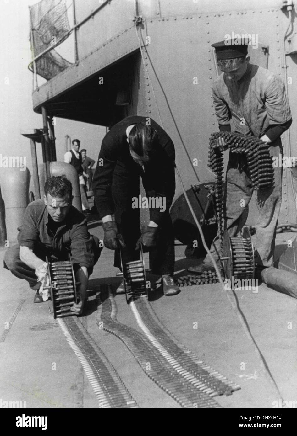 For The Guns - Loading drums of anti-aircraft machine gun bullets ...