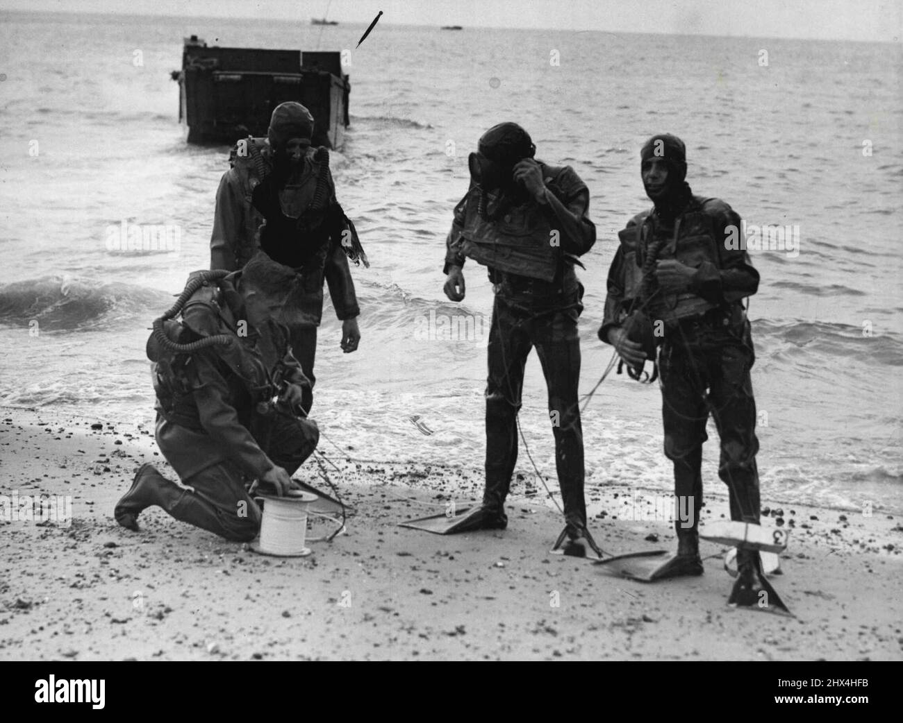Staff College Men Watch On Amphibious Exercise -- Frogmen, having ...