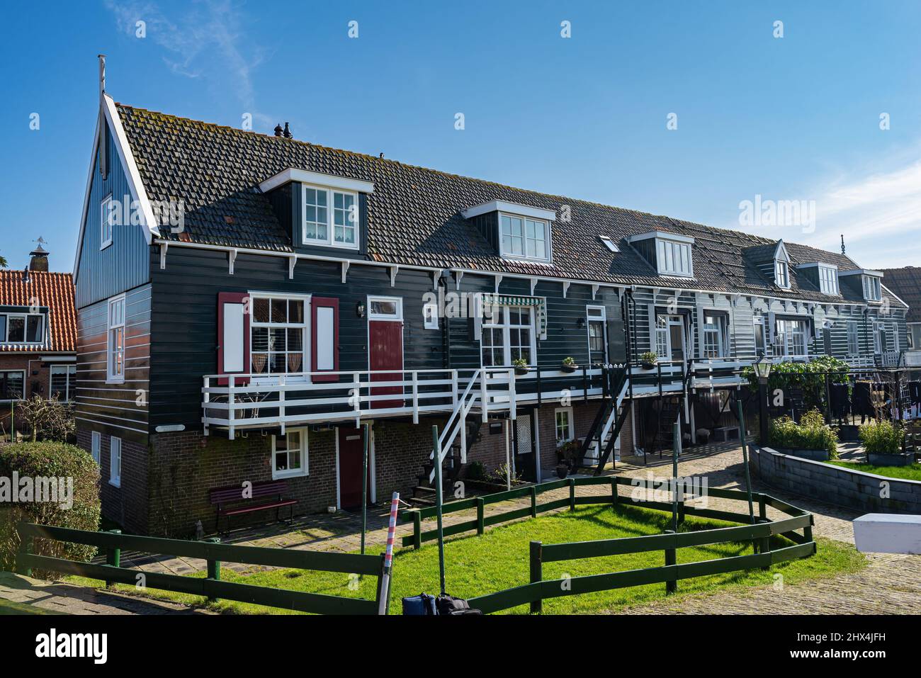 Scenic wooden houses in the historic village of Marken, Netherlands ...