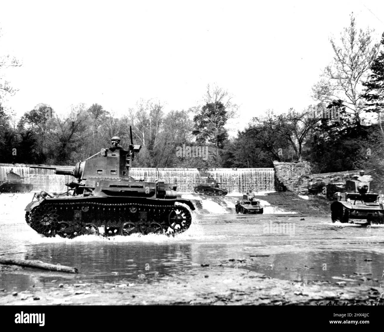 Fording Practice -- Light tanks of the first armored division maneuver ...