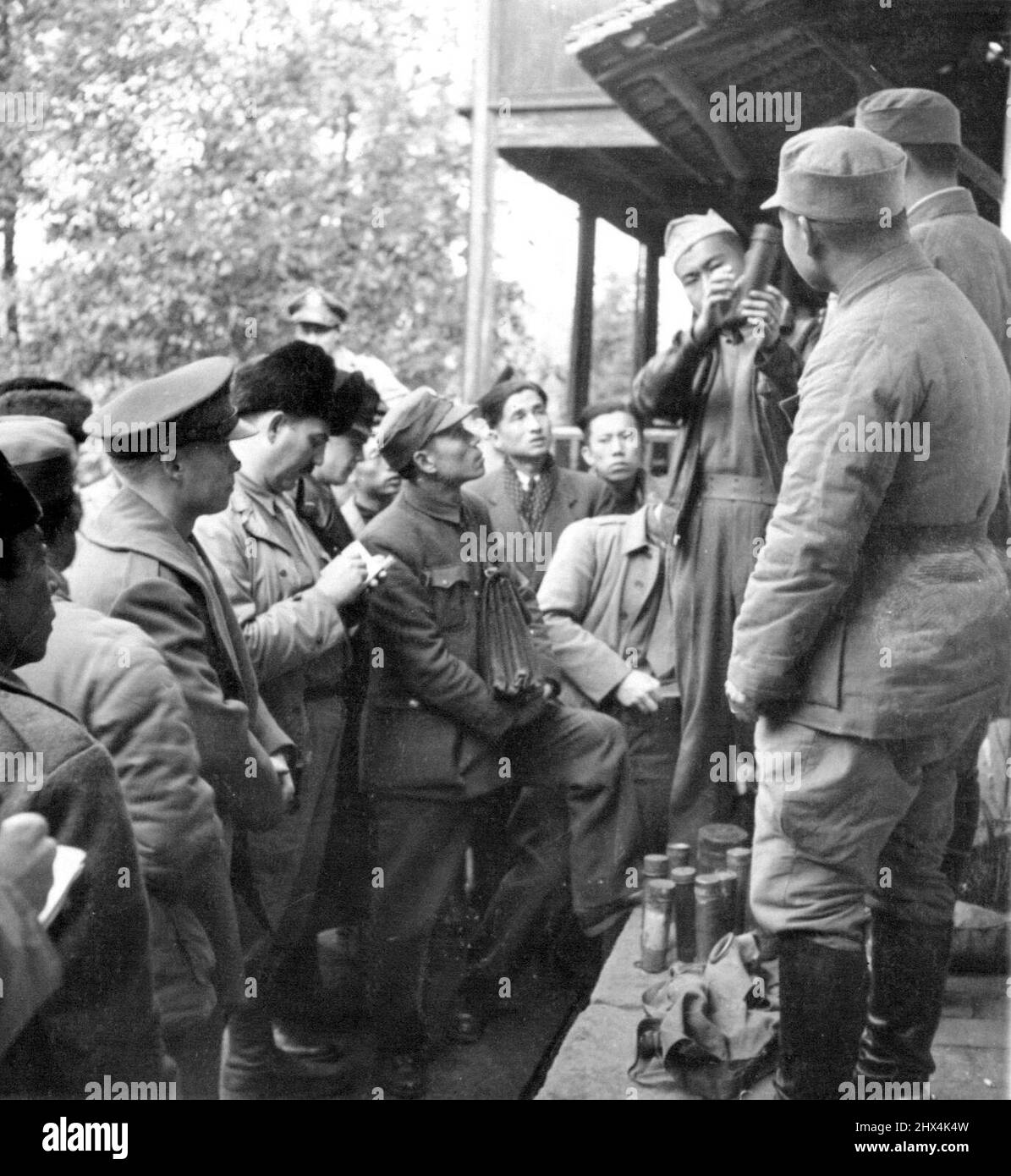 Chinese Exhibit Jap Gas Bomb -- Gen. Liang Han-ming of the Chinese Army ...