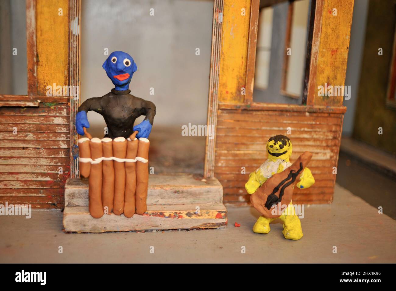 Clay version of Blue Man Group drummer on movie set, used in stop ...