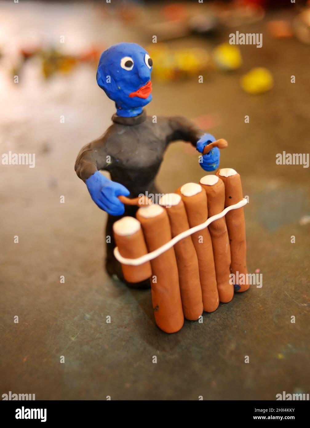 Clay version of Blue Man Group drummer on movie set, used in stop ...