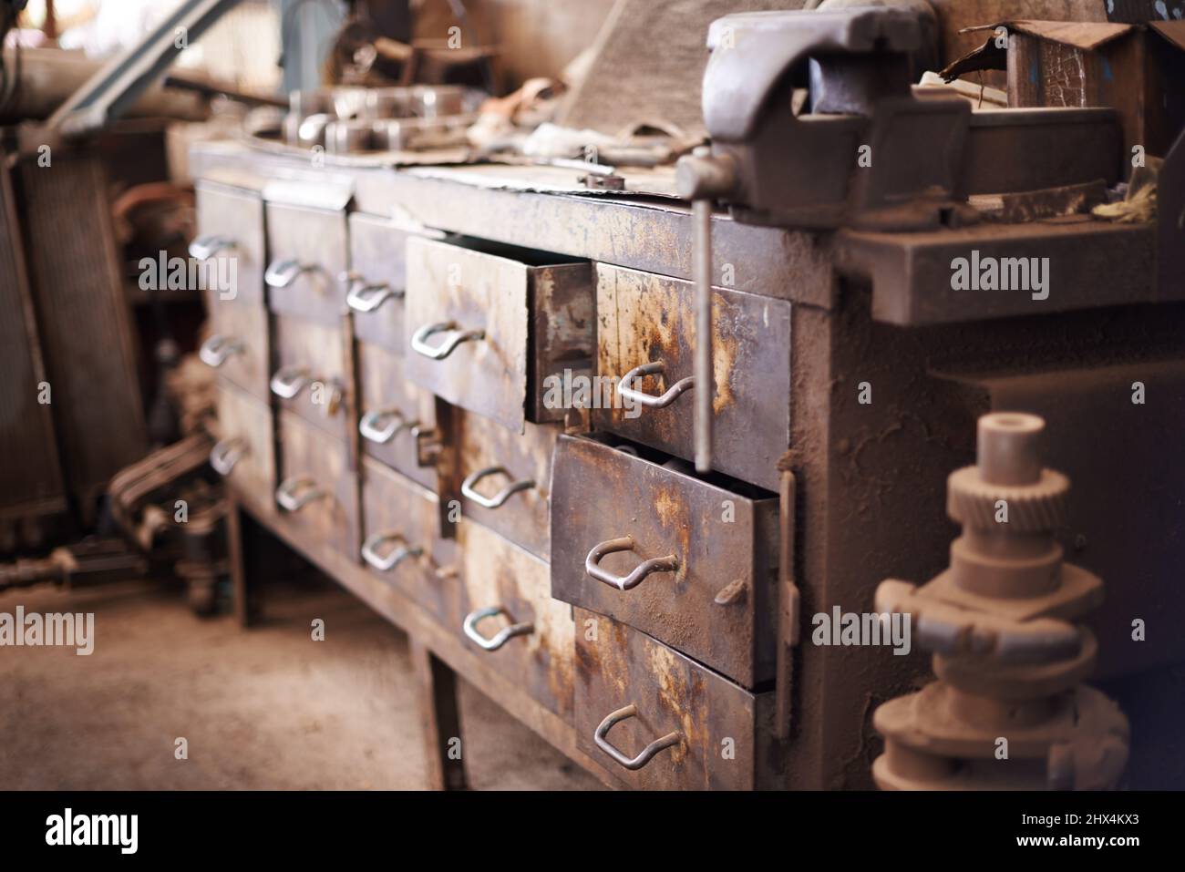 This bench has seen a lot of work. Shot of an old workbench Stock Photo ...