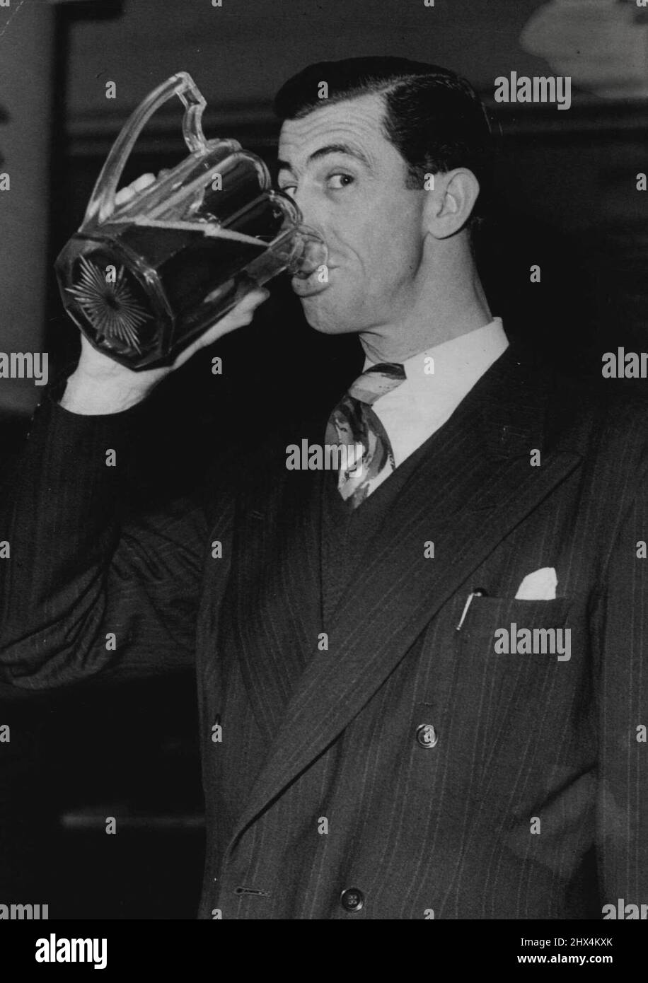 'The Overlander' Has A Thirst -- Chips Rafferty disposes of a pint of ...