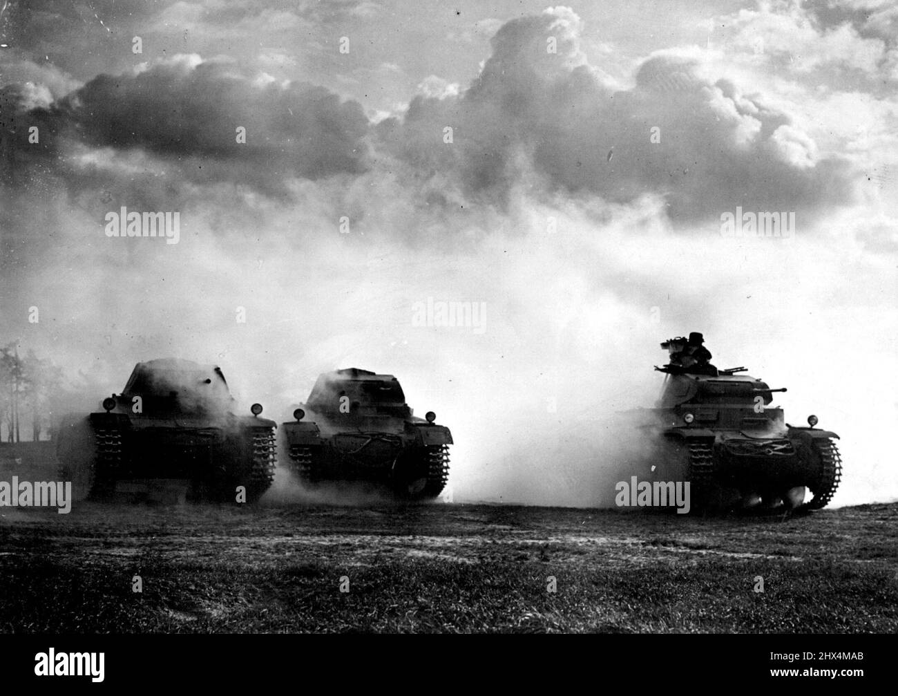 From the German army -- A tank unit during cross country maneuvers ...