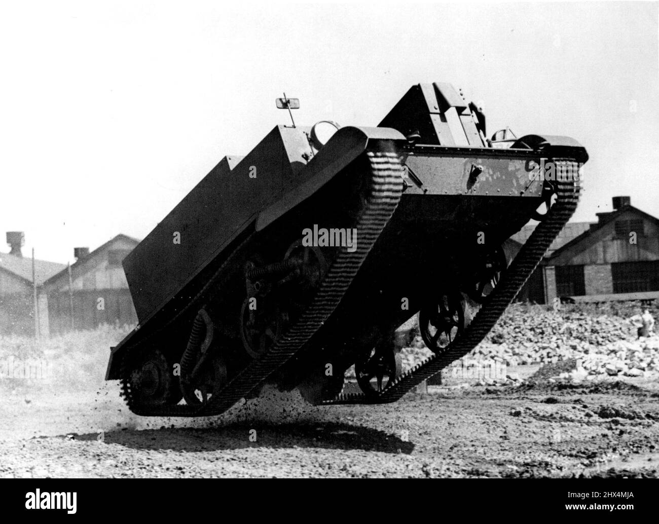 Jumping To It -- A mechanisod machine gun carrier jumps in the air when ...