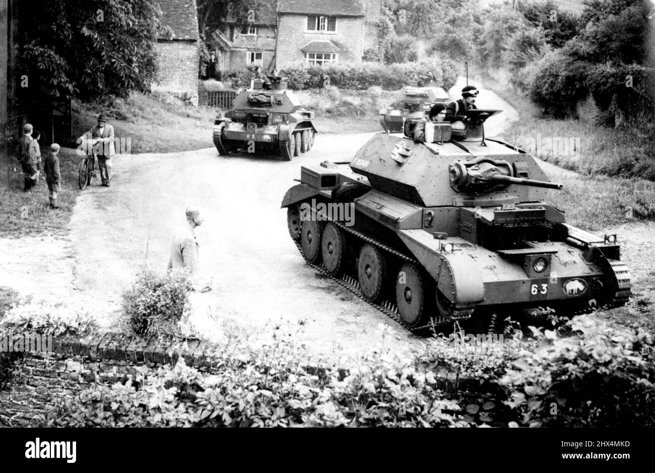 A Day With The Royal Tank Regiment -- Three Tanks passing down a ...