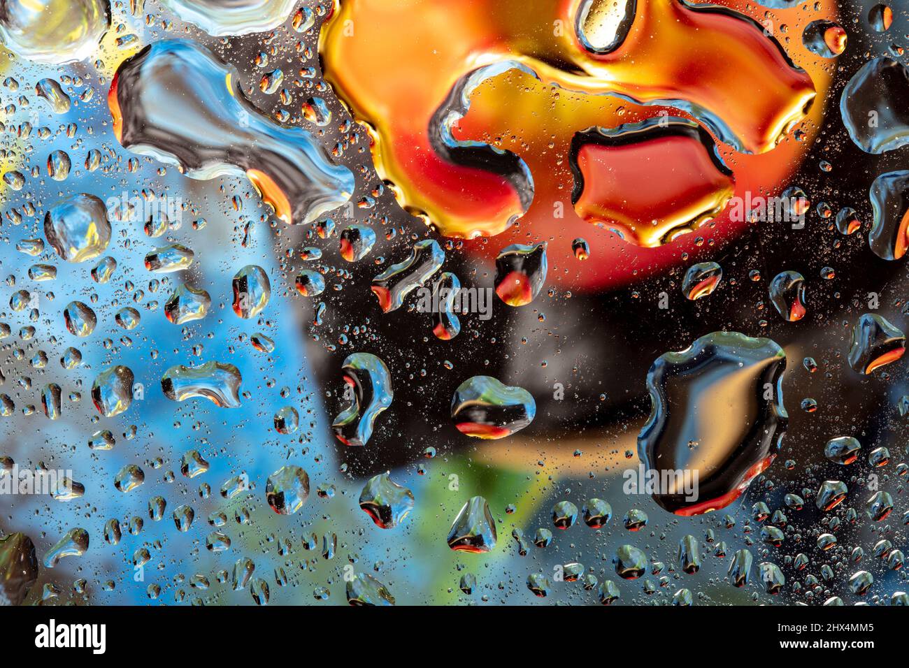 Creative water drop photograph with clear reflections Stock Photo - Alamy