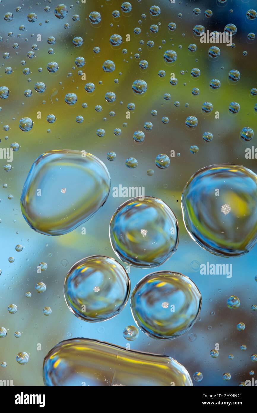 Creative water drop photograph with clear reflections Stock Photo - Alamy