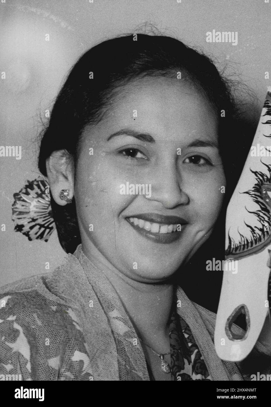 Its wearer, pretty Mrs. Mona Salim, wife of an official of the ...