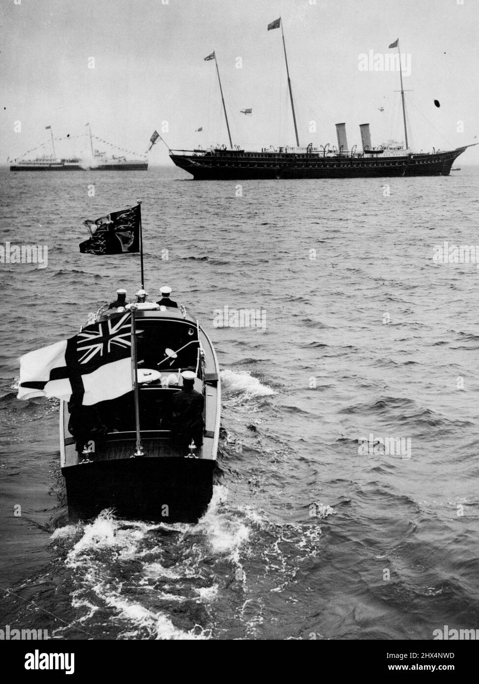 The King Inspects Reserve Fleet: The Royal Barge heading towards the Royal Yacht Victoria and ...