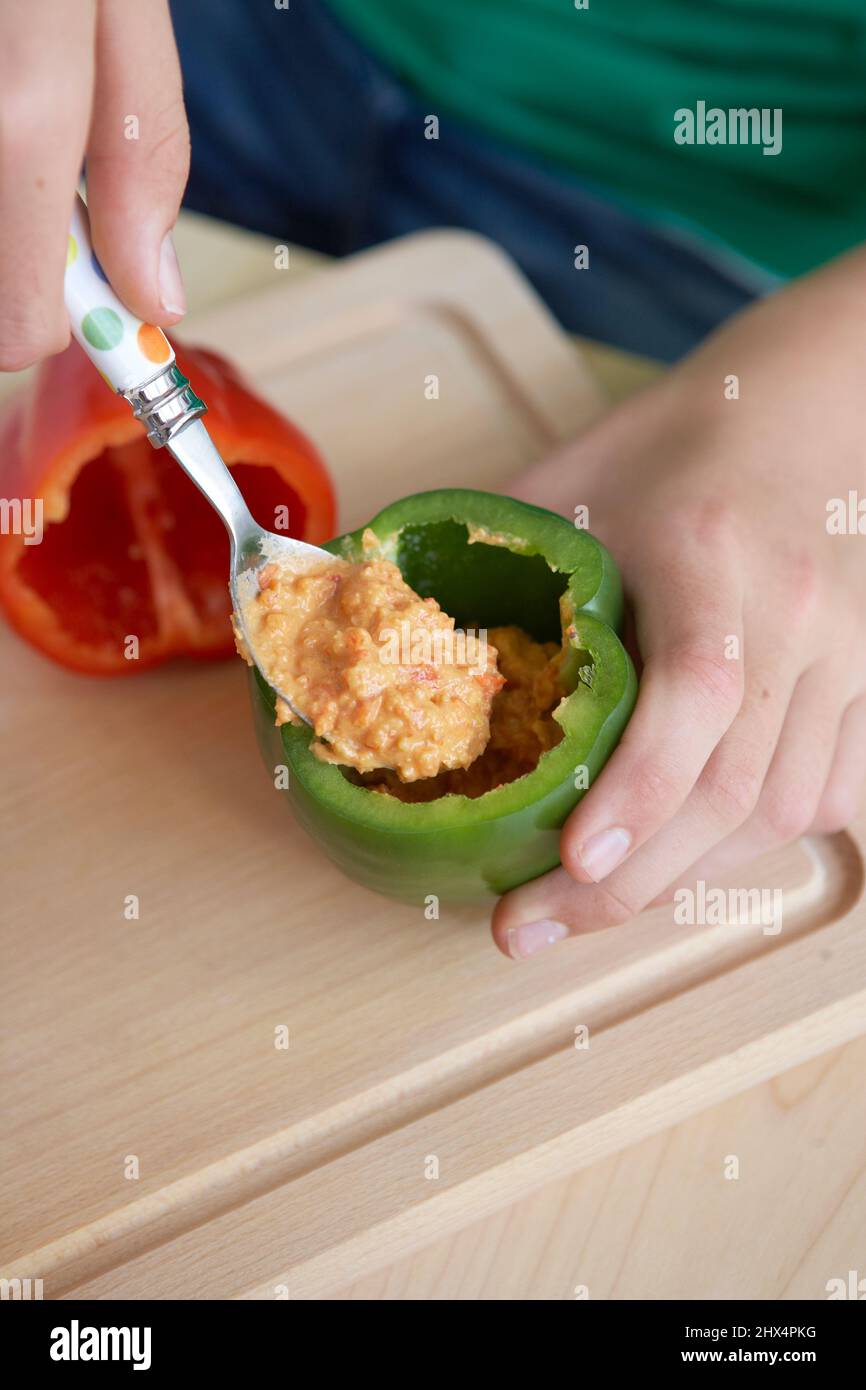 Adding green peppers hi-res stock photography and images - Alamy