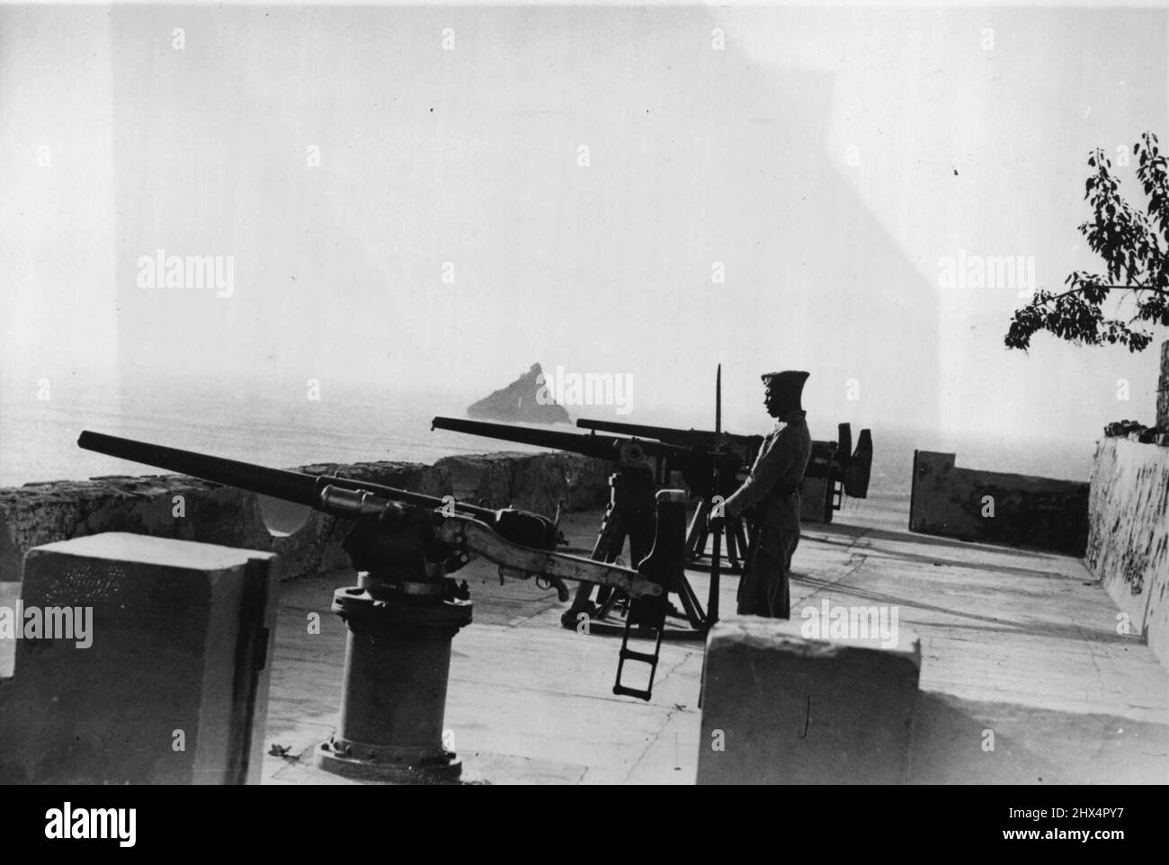 Coastal Defense Guns In The Cape Verdes -- A Portuguese soldier looks ...